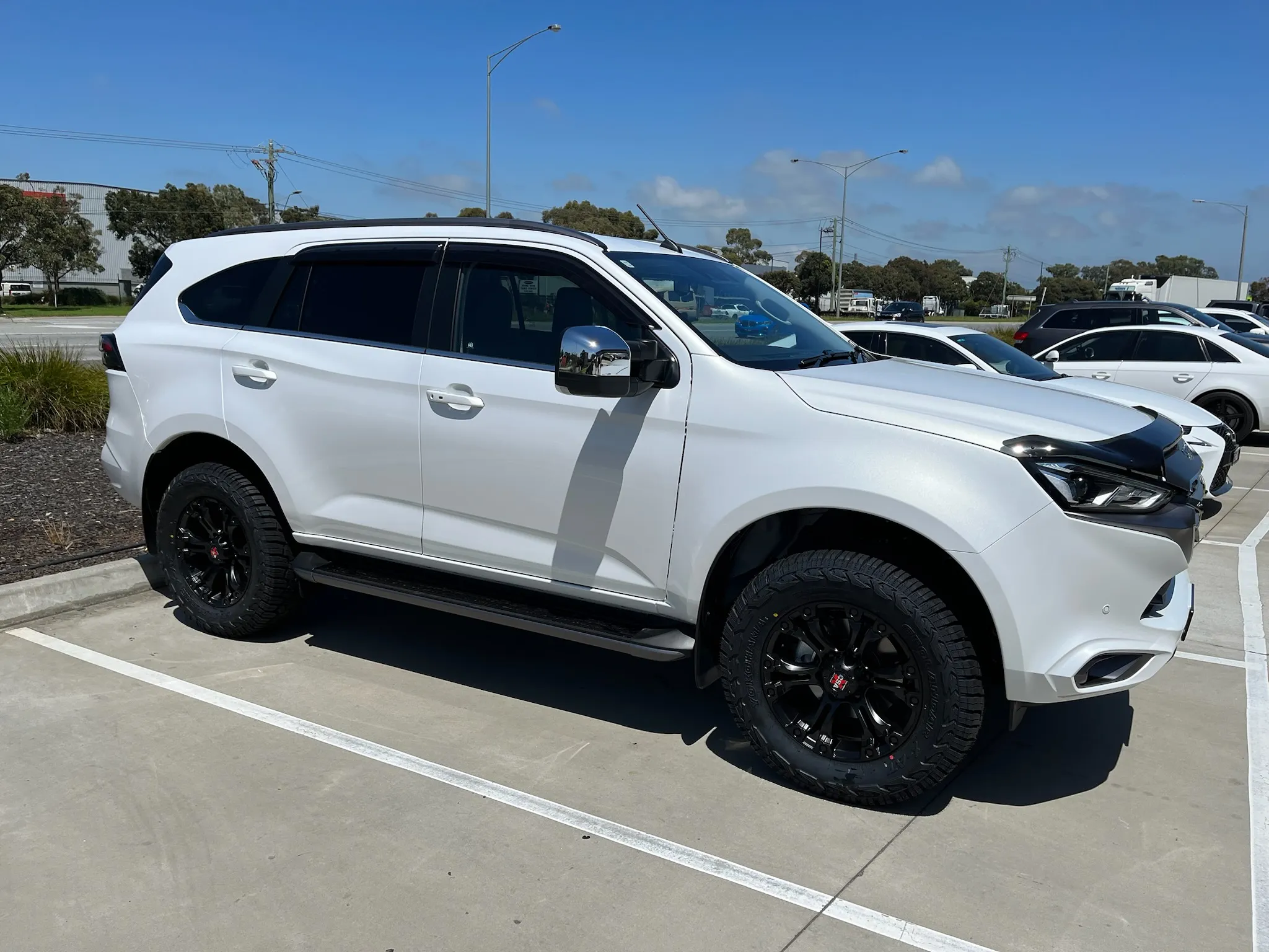 ISUZU MUX with CSA RT PRO 18X8 MATTE BLACK and YOKOHAMA G016 XAT