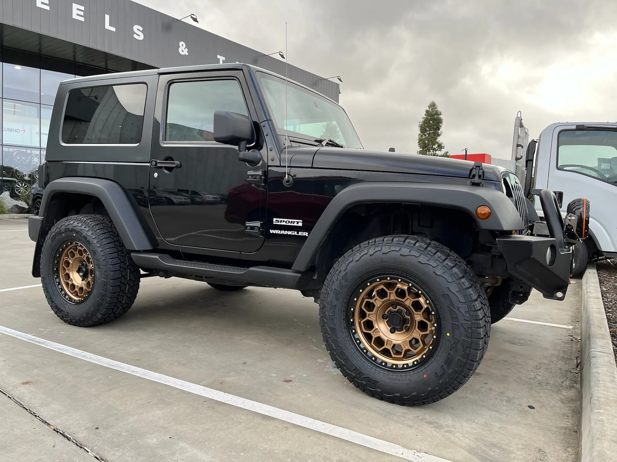 JEEP WRANGLER with KMC 545 17X9 and FALKEN WILDPEAK AT3W