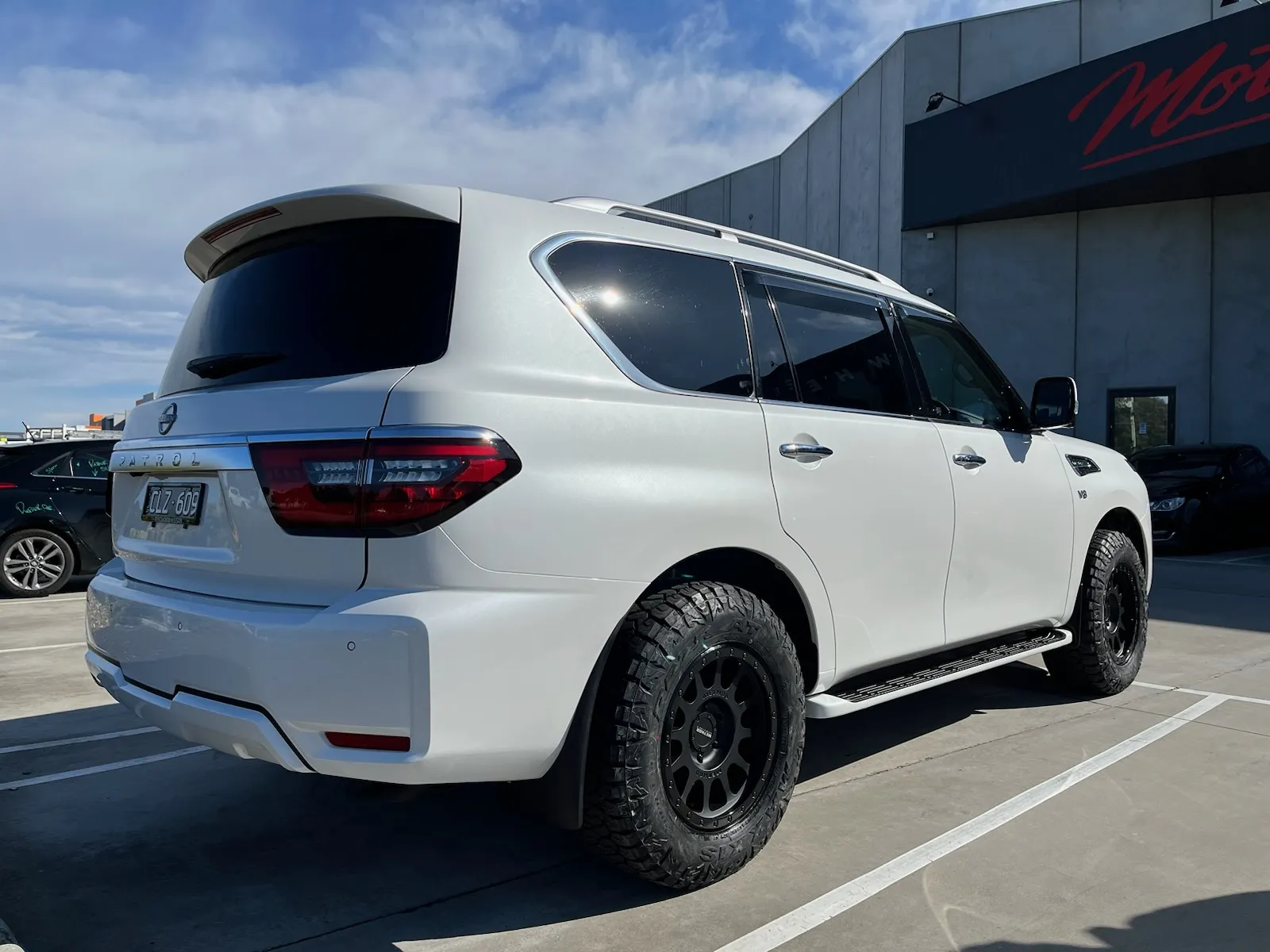 NISSAN PATROL Y62 with METHOD 305 NV DOUBLE BLACK 18X9